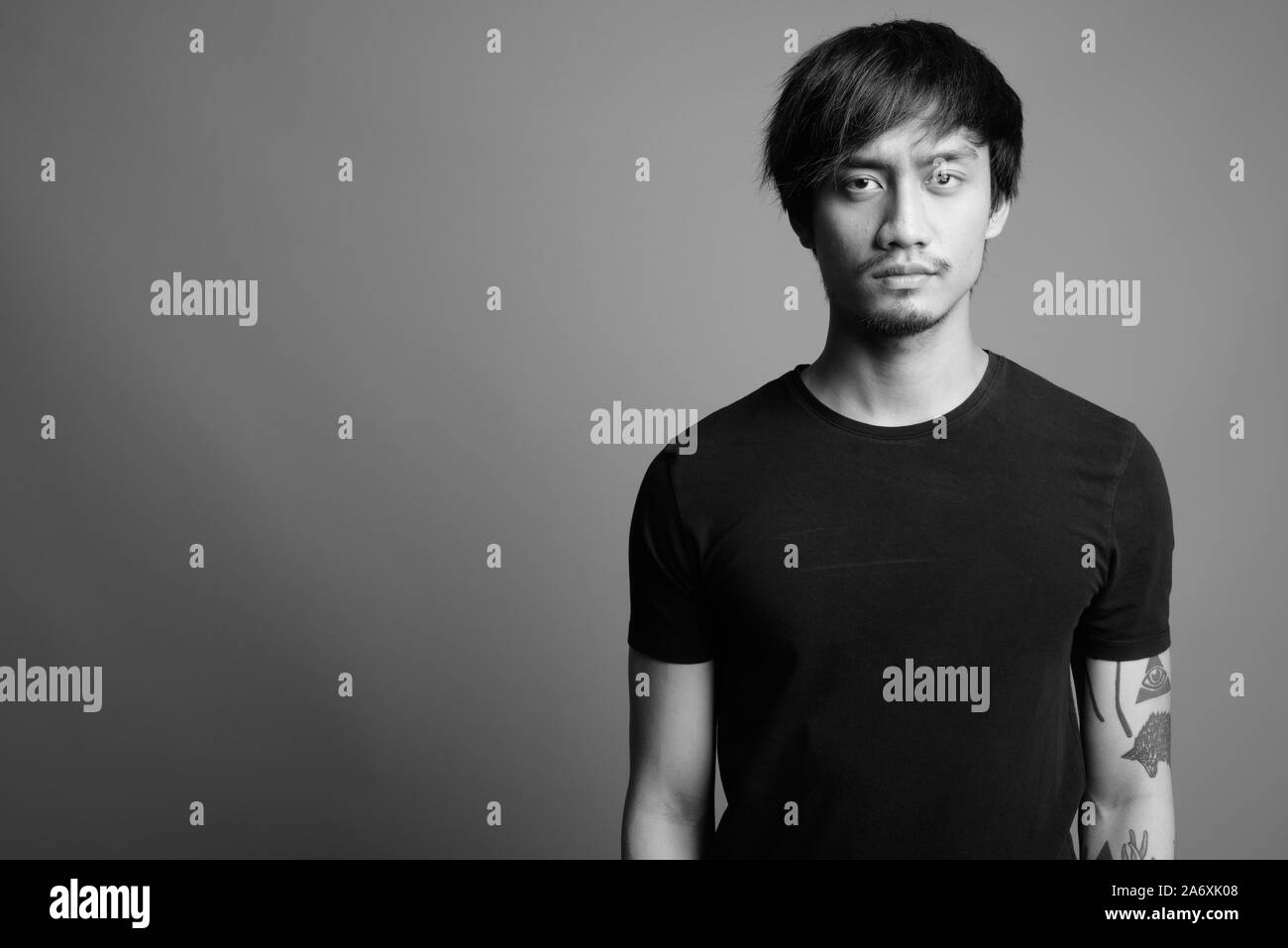 Portrait of young Asian man in black and white Stock Photo - Alamy