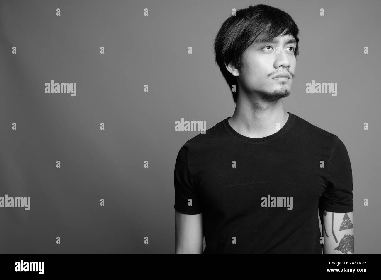 Portrait of young Asian man in black and white Stock Photo - Alamy