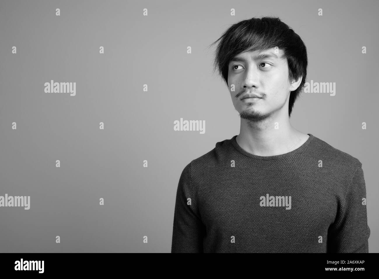 Portrait of young Asian man in black and white Stock Photo - Alamy