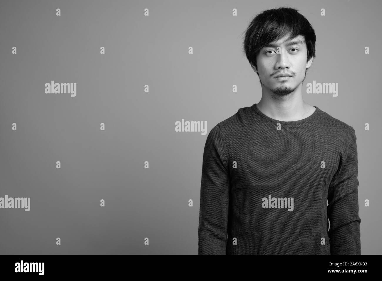 Portrait of young Asian man in black and white Stock Photo - Alamy