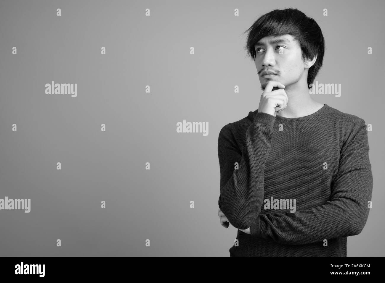 Portrait of young Asian man in black and white Stock Photo - Alamy