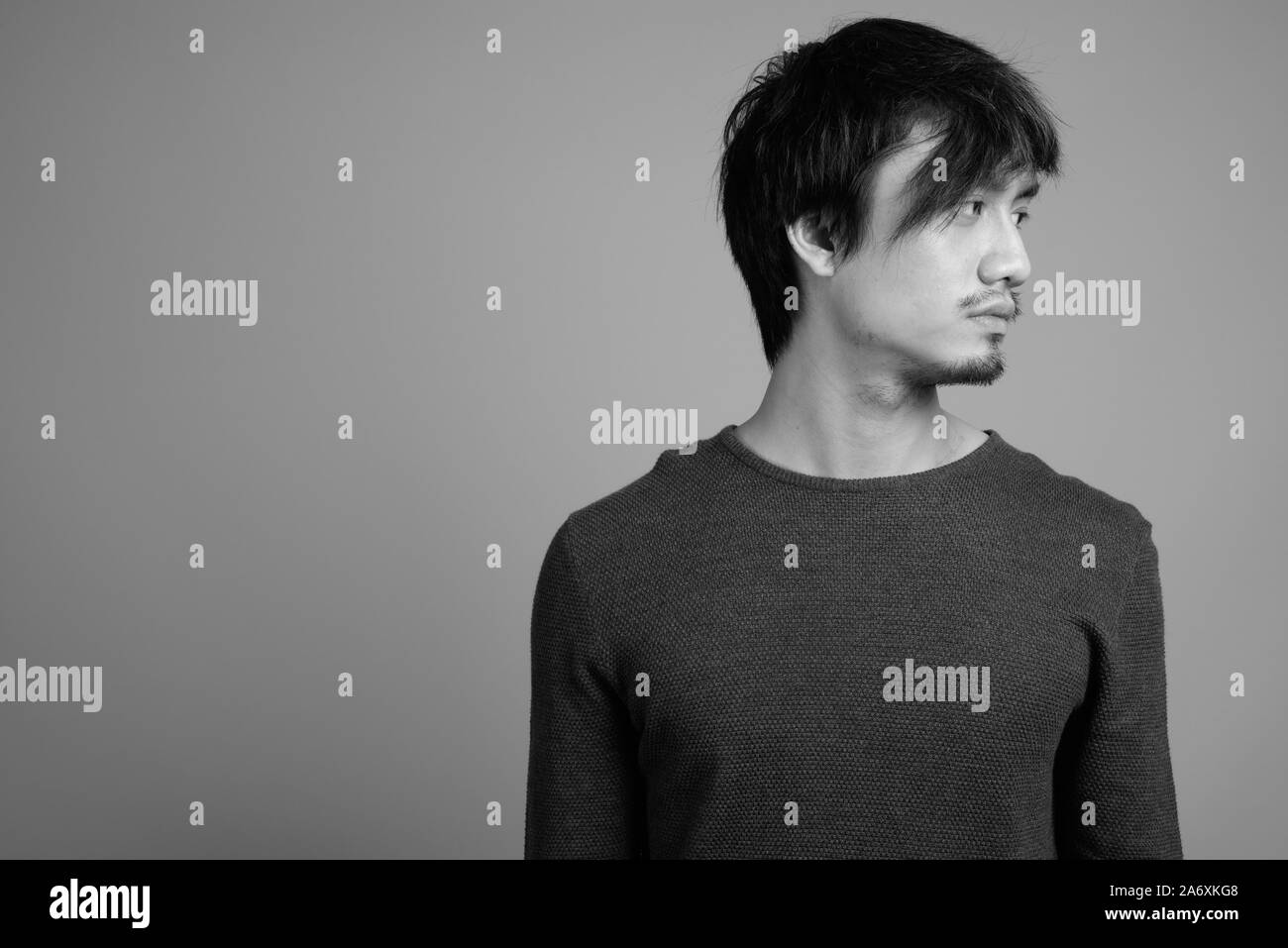 Portrait of young Asian man in black and white Stock Photo - Alamy
