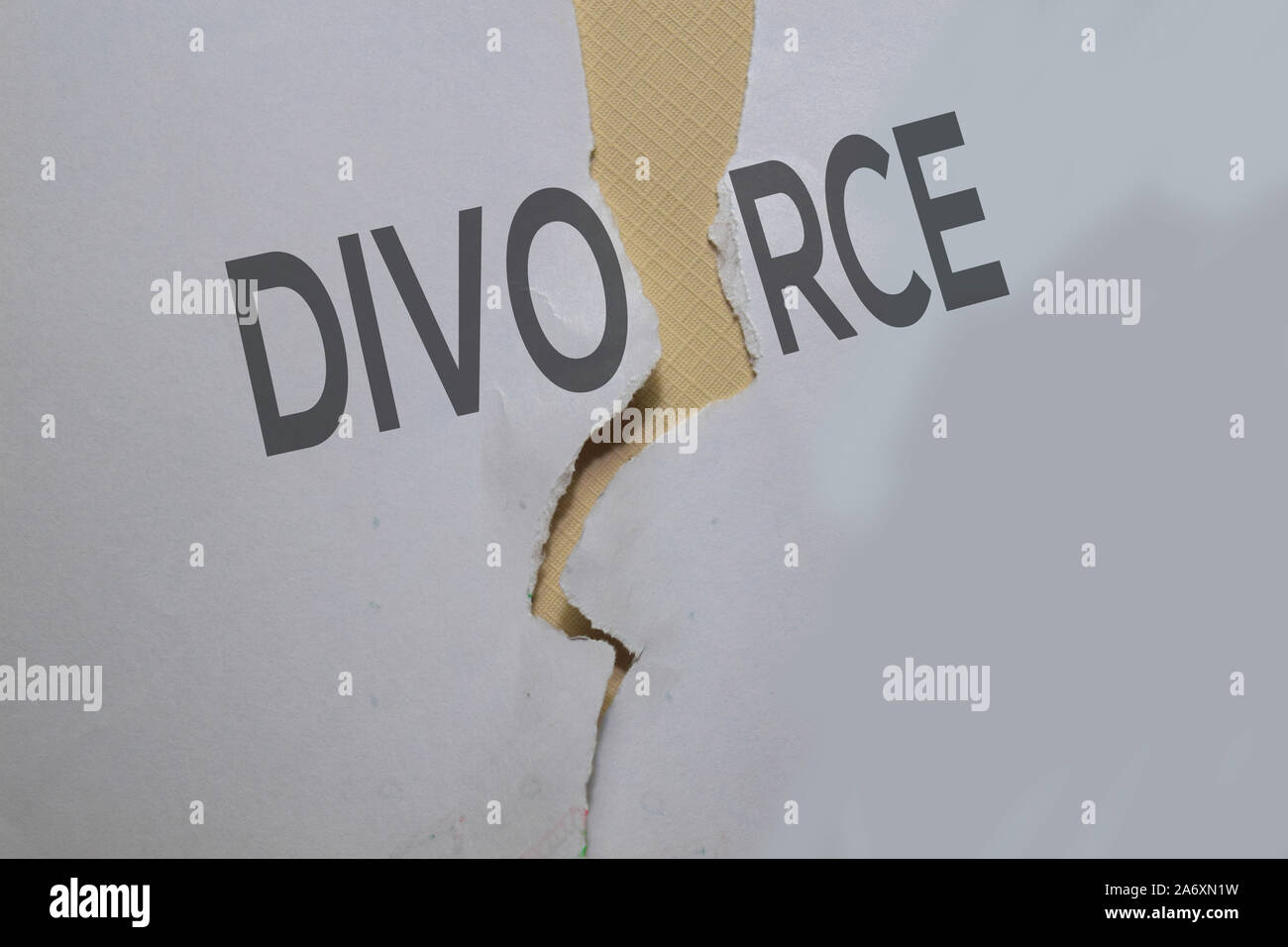 Divorce Text on paper background with crack in the middle Stock Photo ...