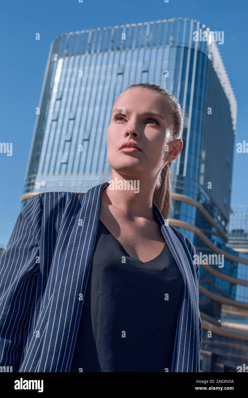 close up. confident young woman looking forward Stock Photo - Alamy