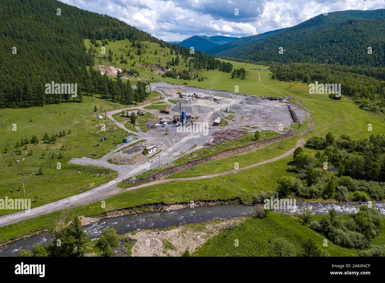 Aerial view of a small plant for the production and cleaning rubble and ...