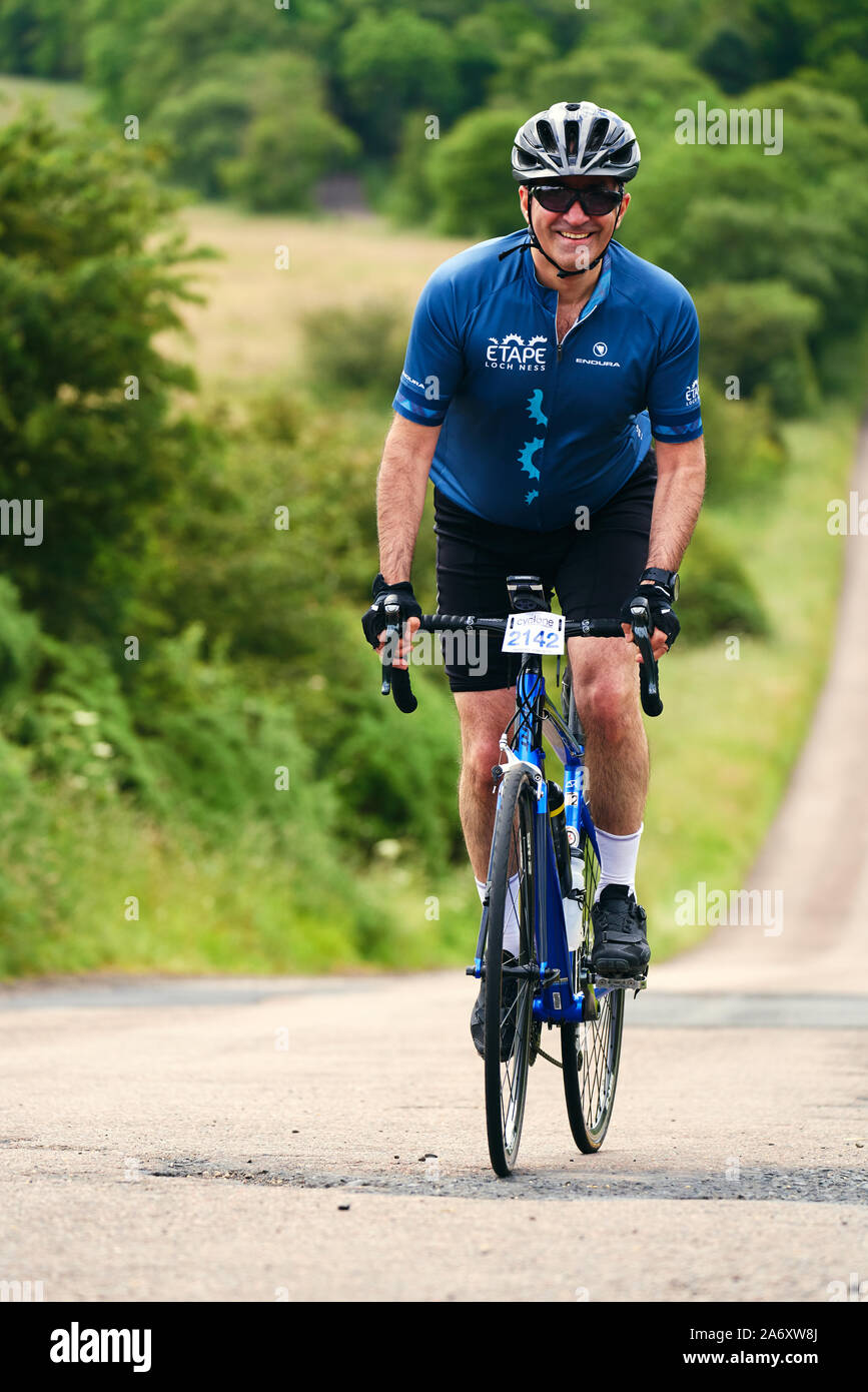 Happy cyclists hi-res stock photography and images - Alamy