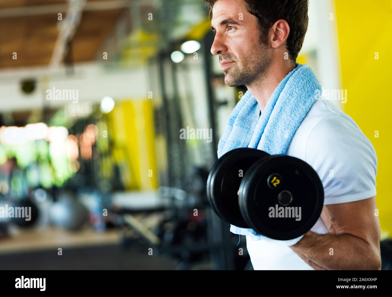 Healthy life and gym exercise concept. Fit man working out in sport ...
