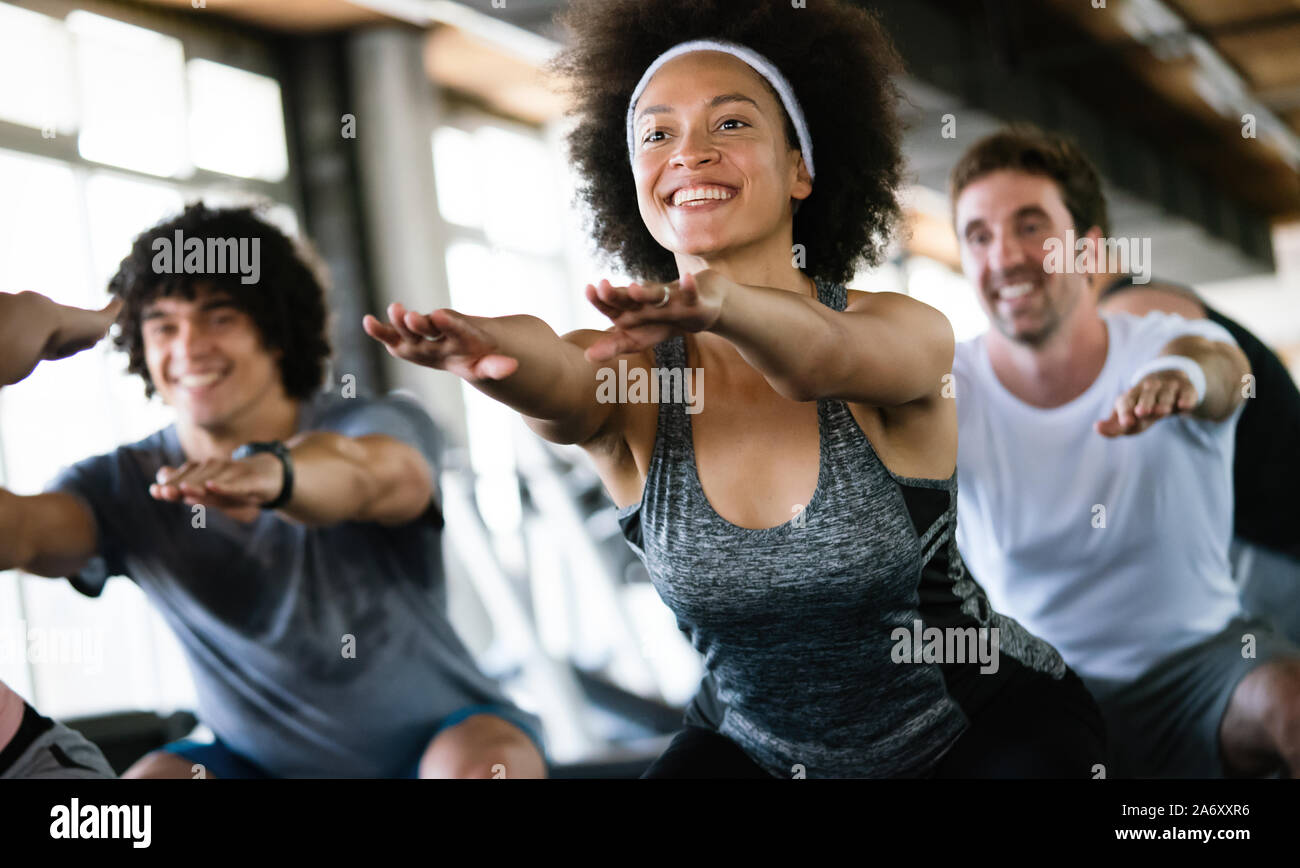 Team workout in gym to reach goals Stock Photo - Alamy