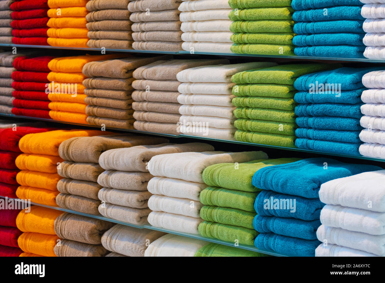 colorful towels on store shelves Stock Photo - Alamy