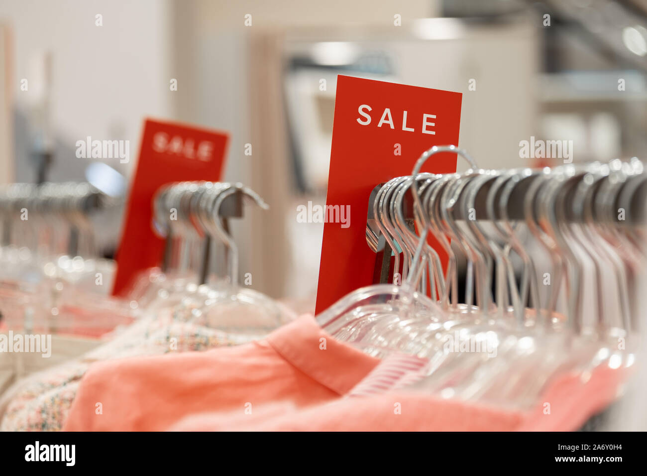 signs with words sale in stores on hangers Stock Photo - Alamy