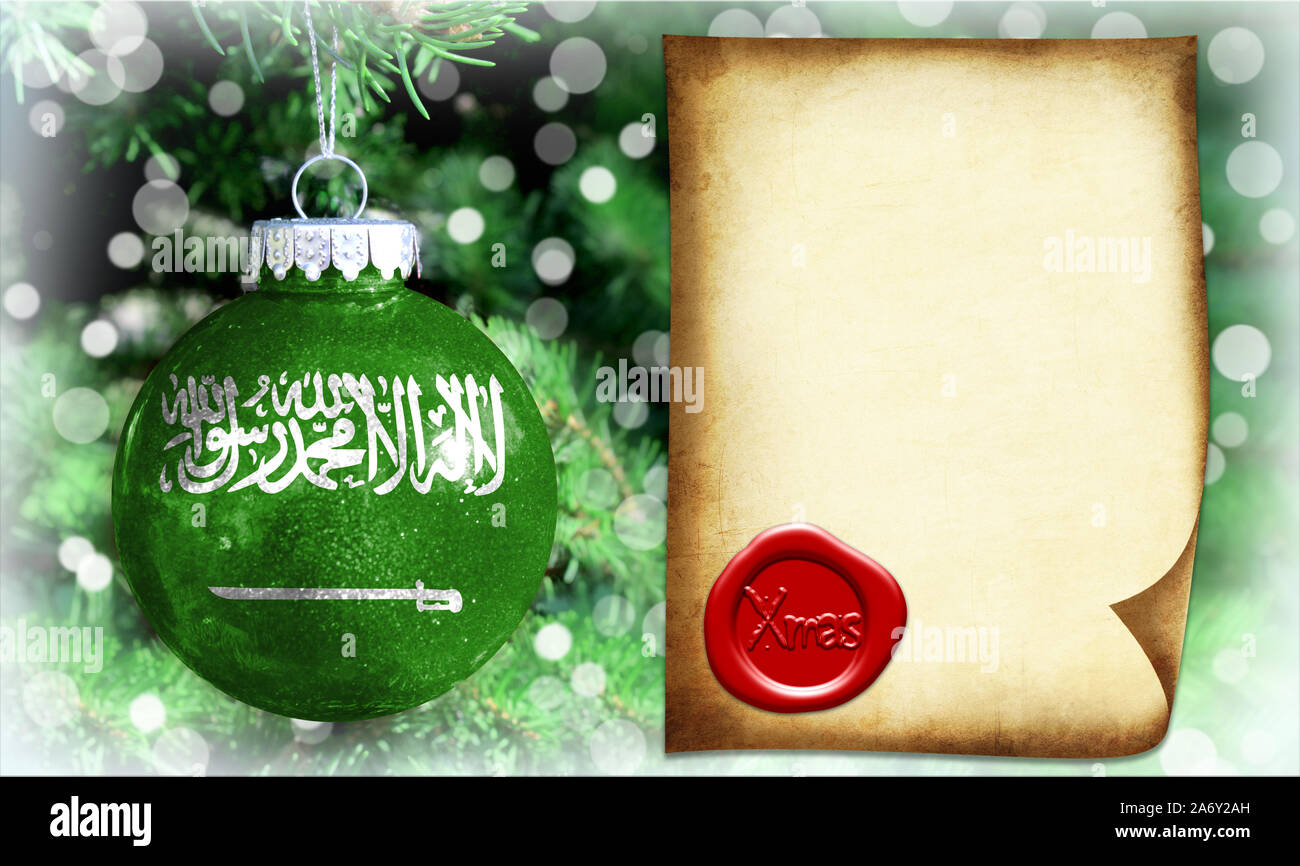 Christmas and New Year background with a flag of Saudi Arabia. There is ...