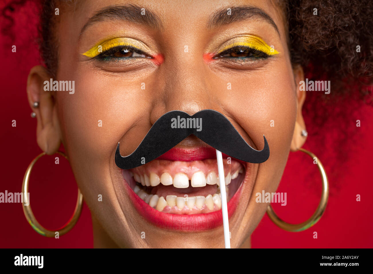 portrait of laughing model with mustache Stock Photo - Alamy