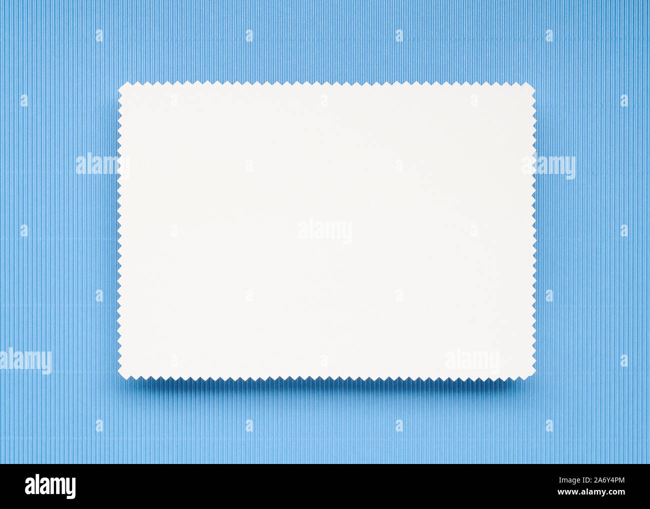 Note Paper on light blue background Stock Photo - Alamy