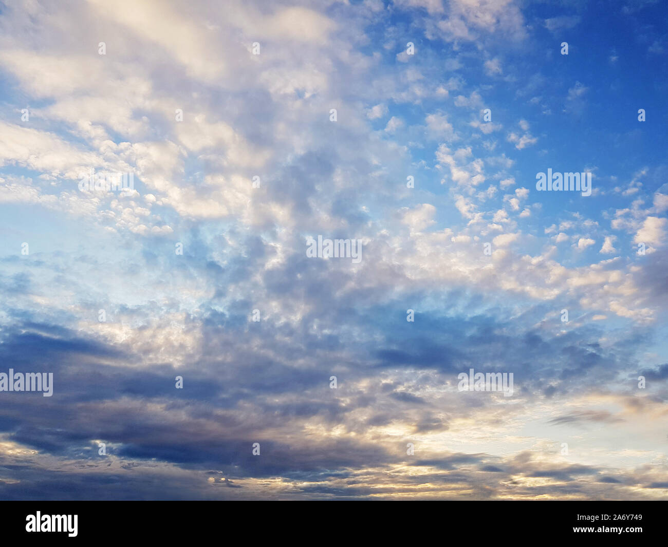 Blue sky clouds background. Beautiful landscape with sunset Stock Photo ...
