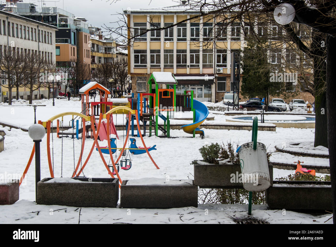 Empty children playground in the snow hi-res stock photography and ...
