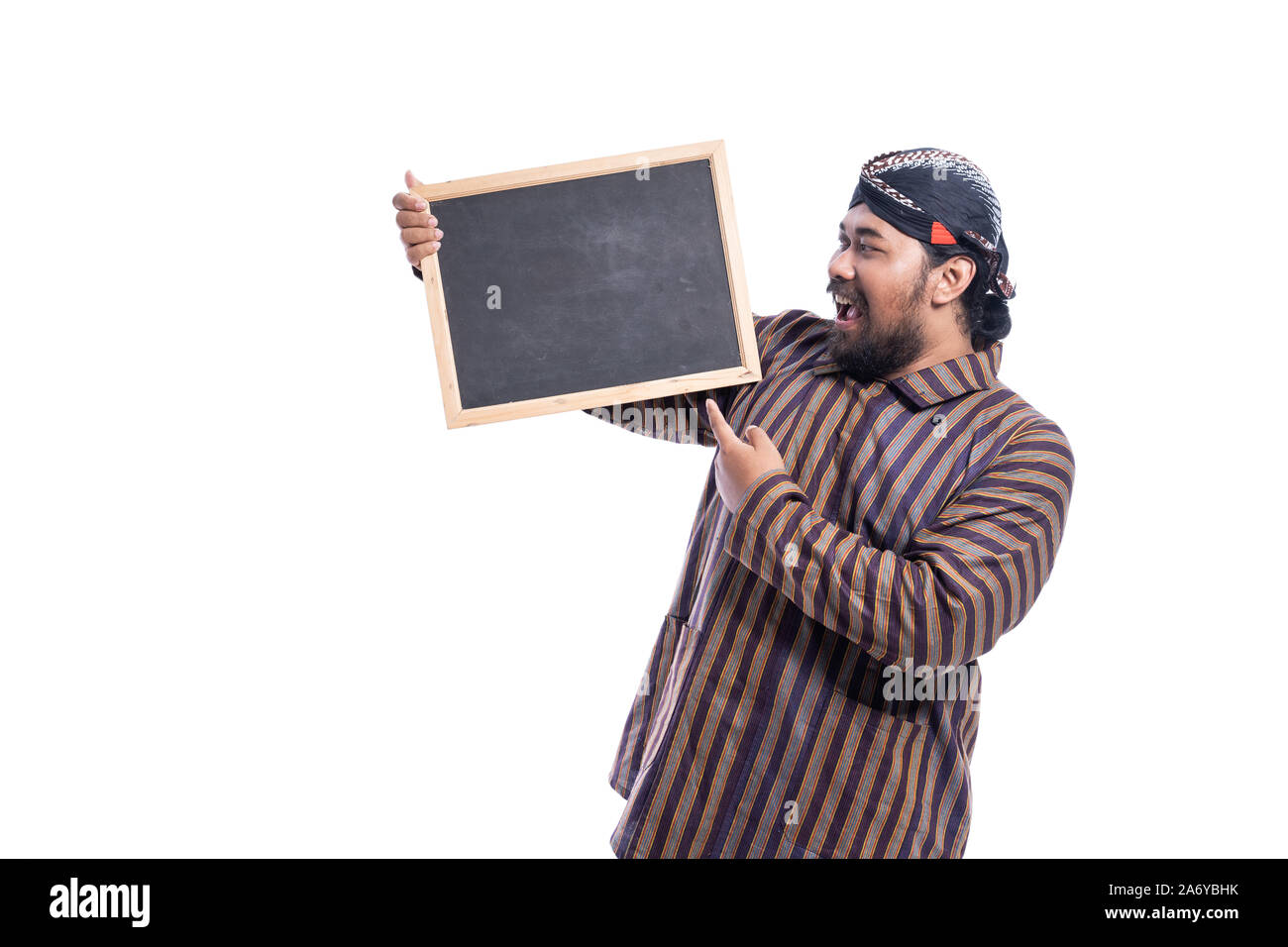 male with javanese traditional cloth lurik holding blacboard Stock ...