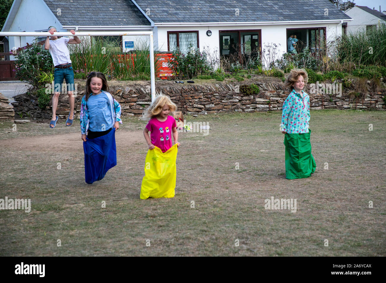 kids having fun on a beach Stock Photo - Alamy
