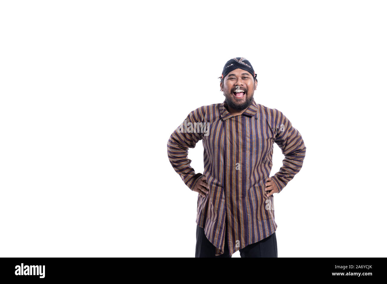 male with javanese traditional cloth lurik raised arm Stock Photo - Alamy
