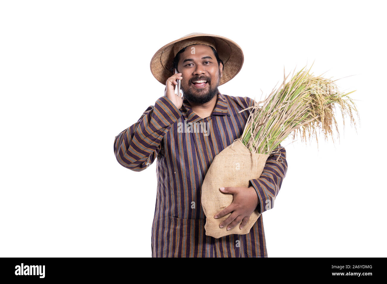 asian farmer using mobile phone isolated over white Stock Photo - Alamy
