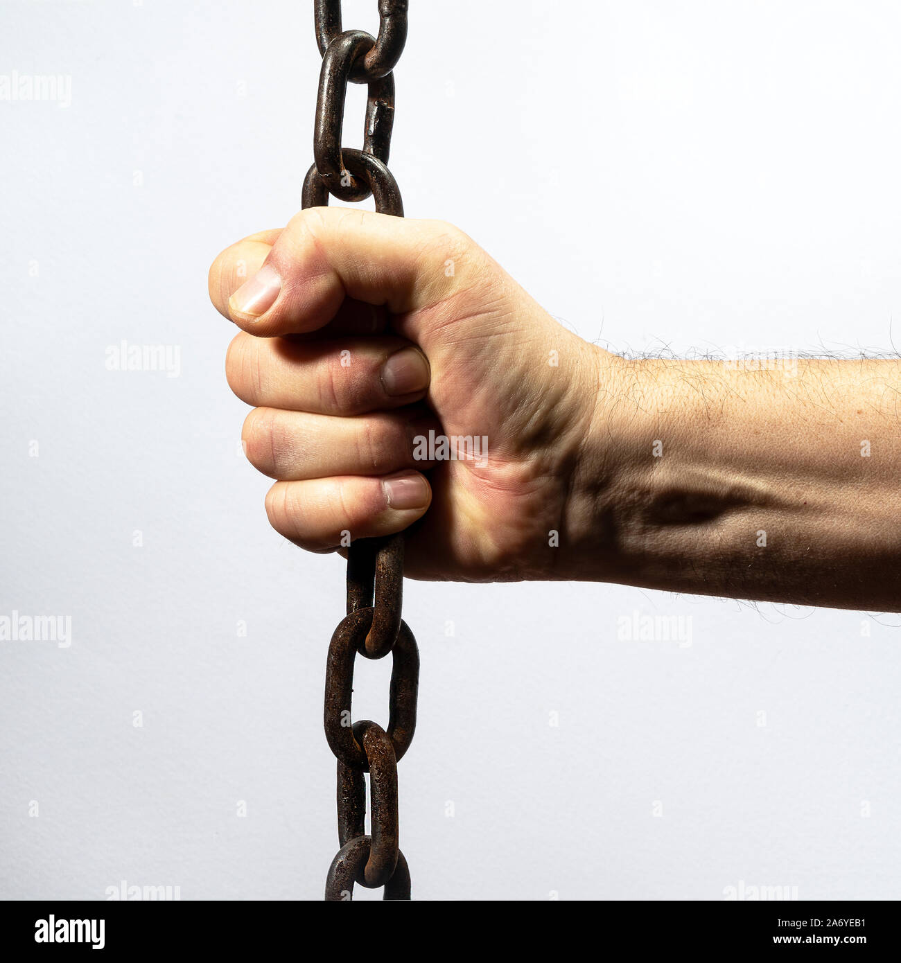 Human hand holding chain hi-res stock photography and images - Alamy