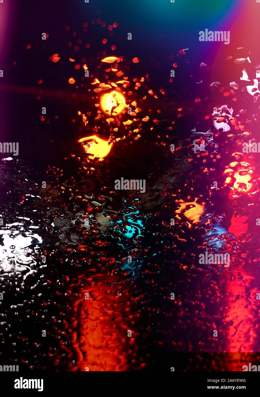 rain drops and colorful lights at night on the window Stock Photo - Alamy