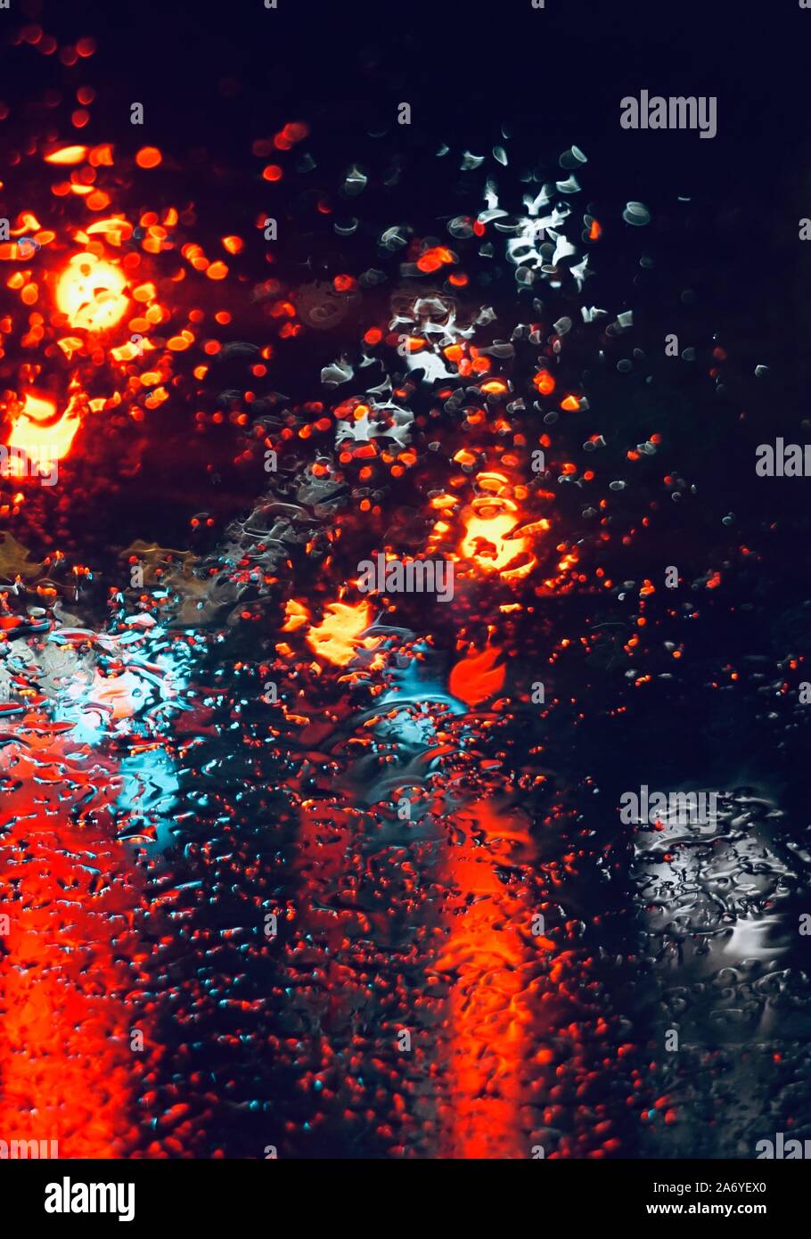rain drops and colorful lights at night on the window Stock Photo - Alamy