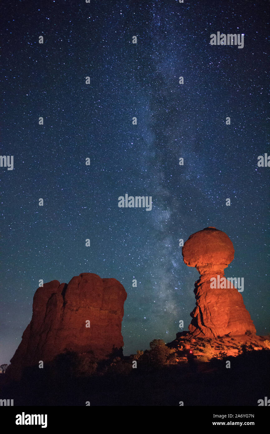 USA, Utah, Moab, Arches National Park, Balanced Rock and Milky Way ...