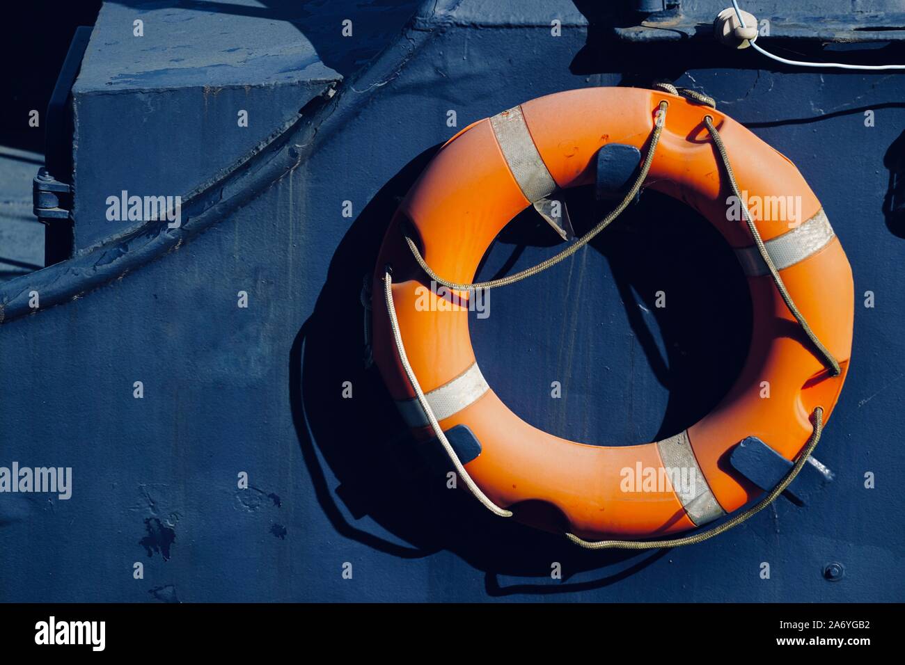 orange lifebuoy in the blue ship Stock Photo - Alamy