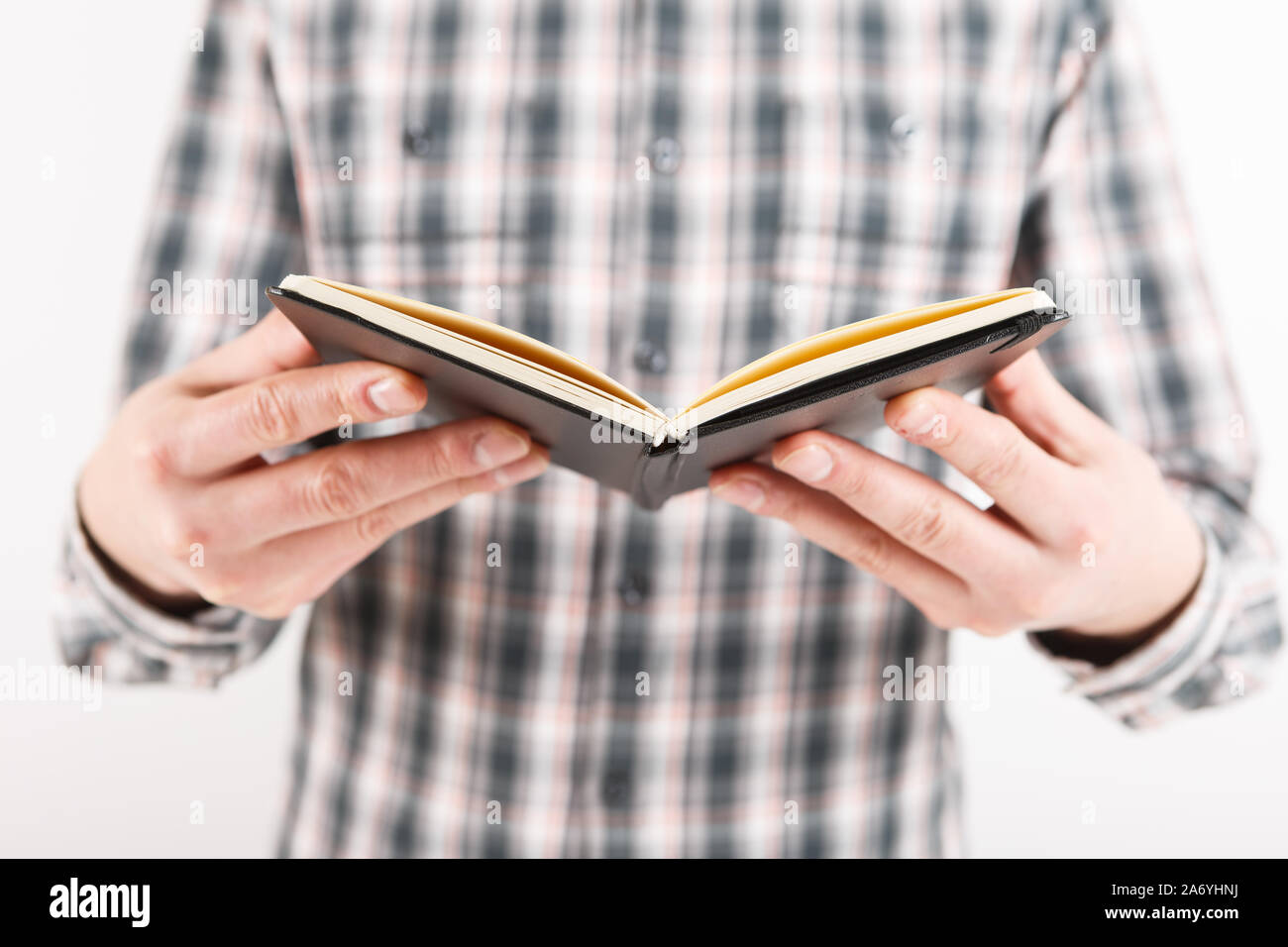 Person hand searching for a book at home on a book shelf Stock Photo ...