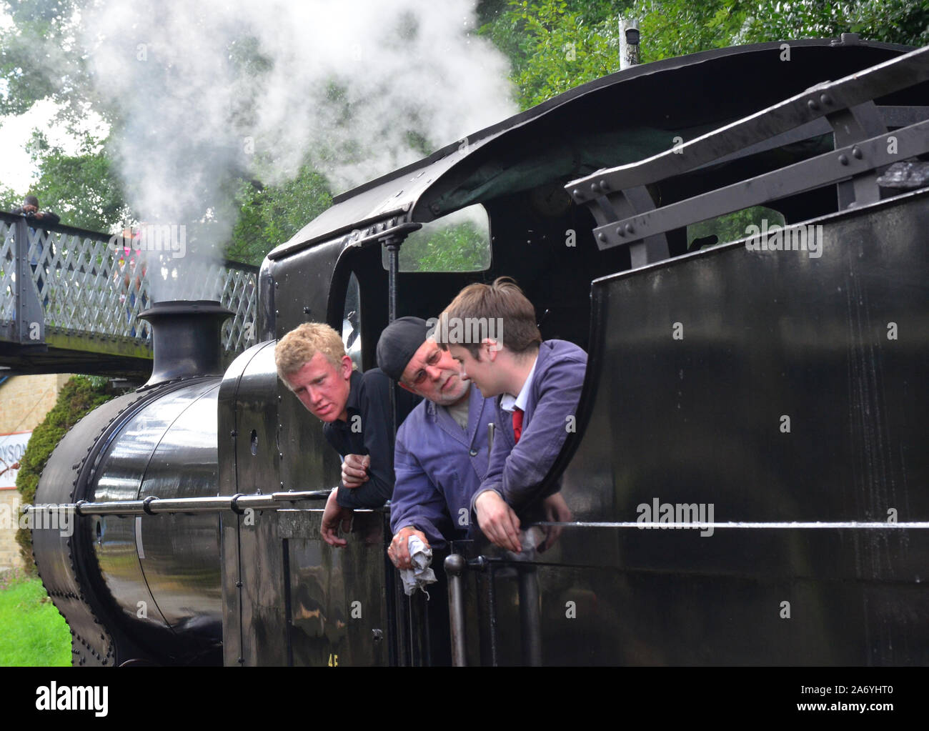 Steam train driver and firemen talking to guard, KWVR, Keighley and ...