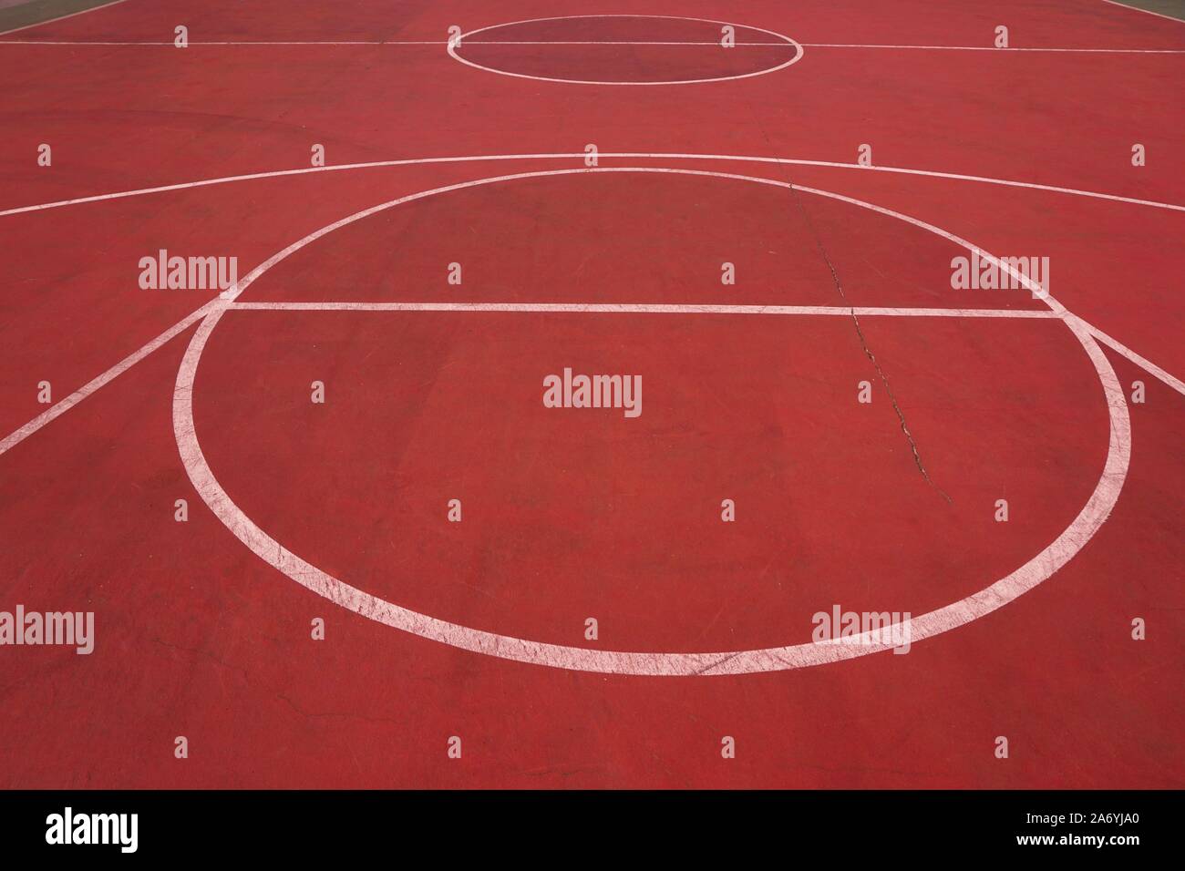 basketball red court with white lines on the street Stock Photo - Alamy