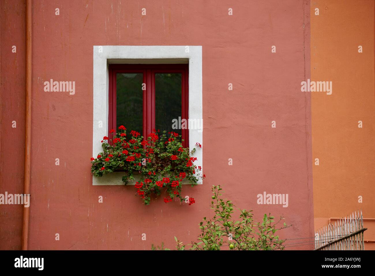 window on the red facade of the house in Bilbao city spain Stock Photo ...