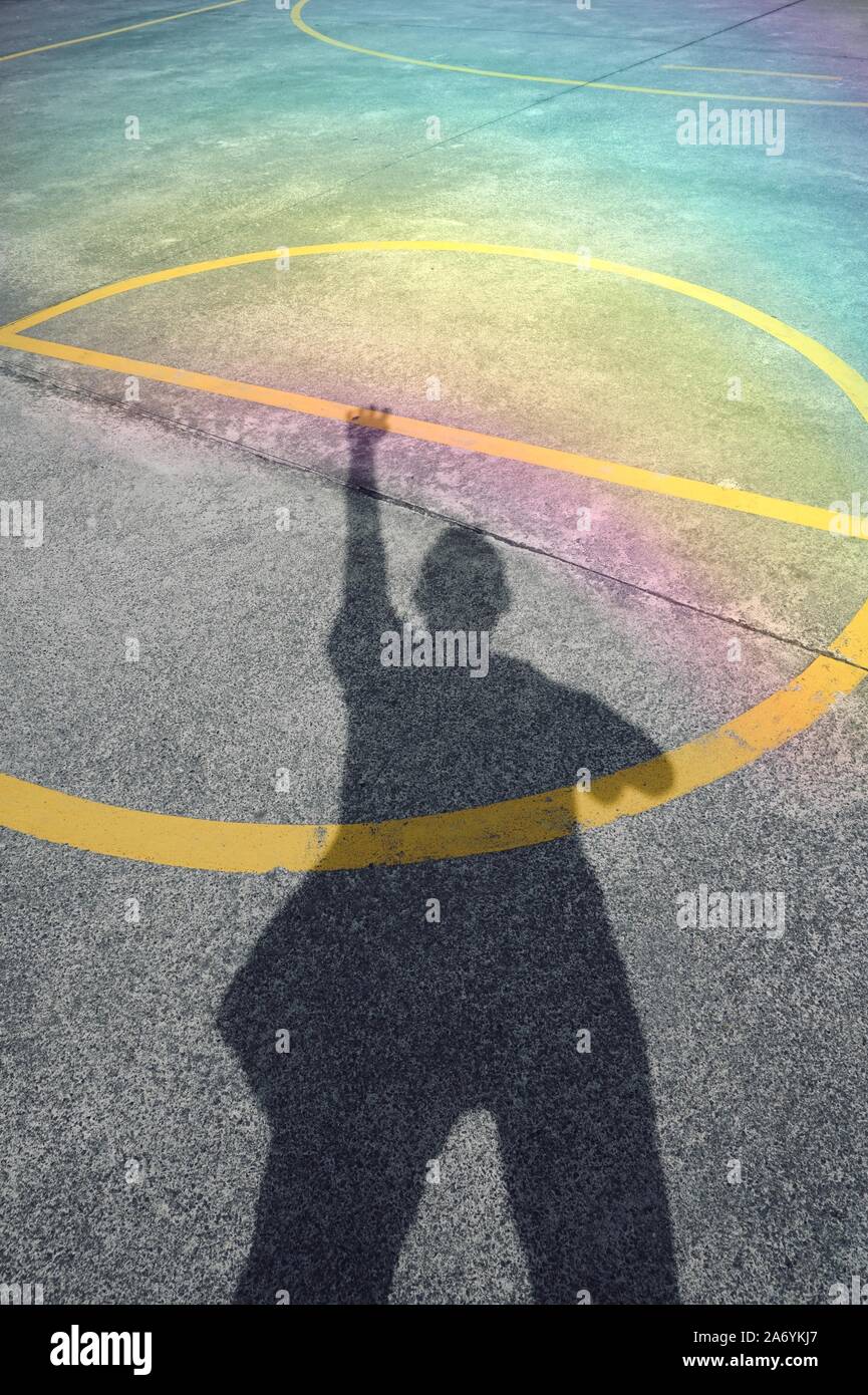 man shadow silhouette on the soccer field on the street Stock Photo - Alamy