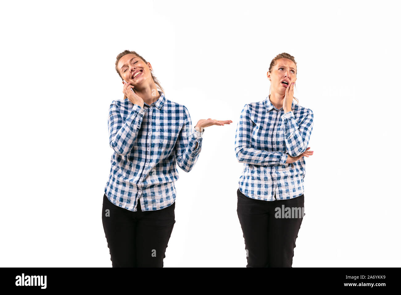 Young handsome woman arguing with herself on white studio background ...
