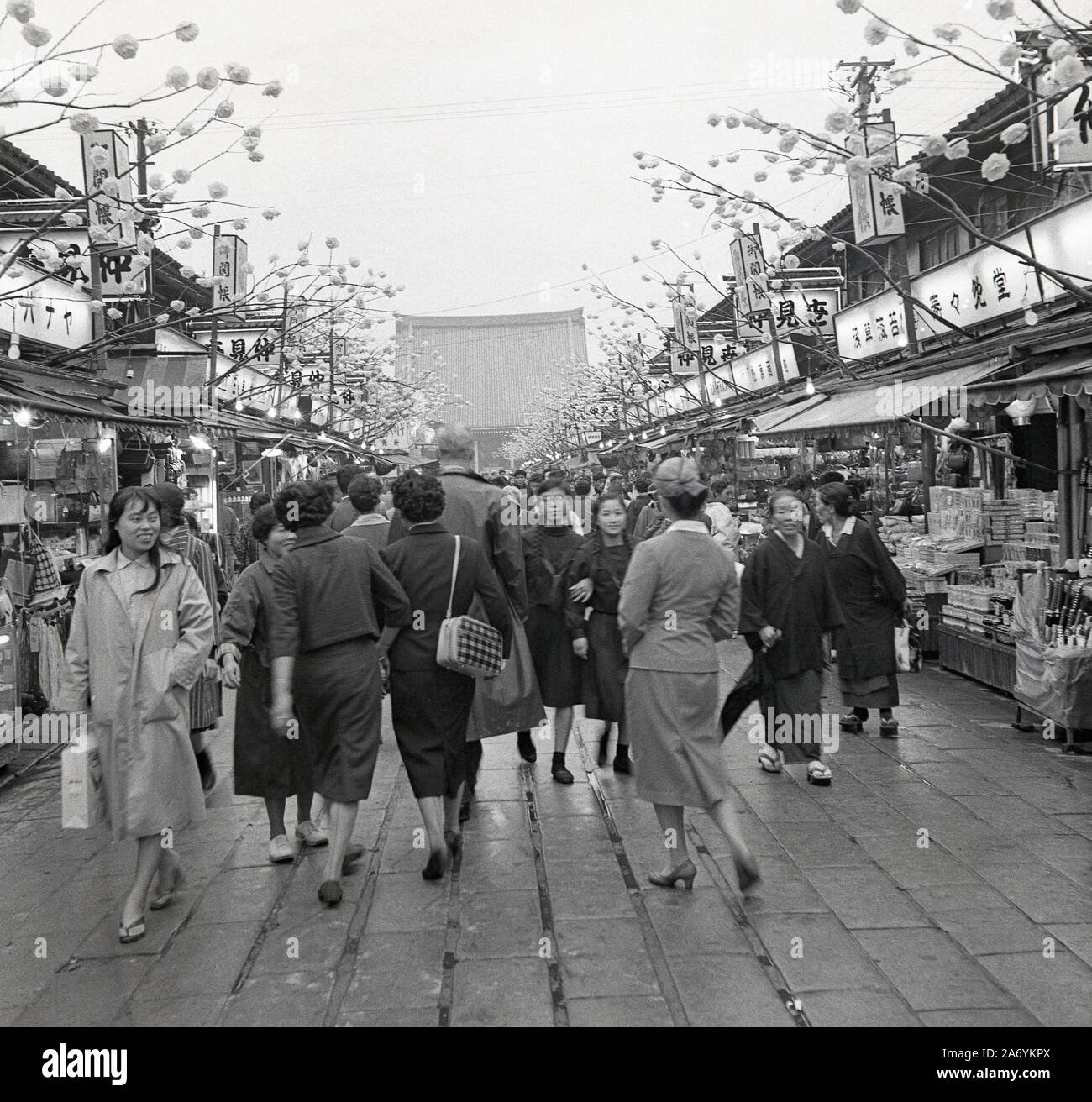 1960s, historical, Tokyo, japanese women shopping outisde in market ...