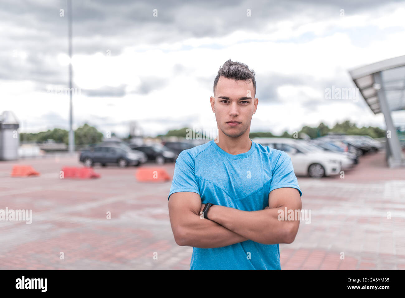 Strong muscular figure stands hi-res stock photography and images - Alamy