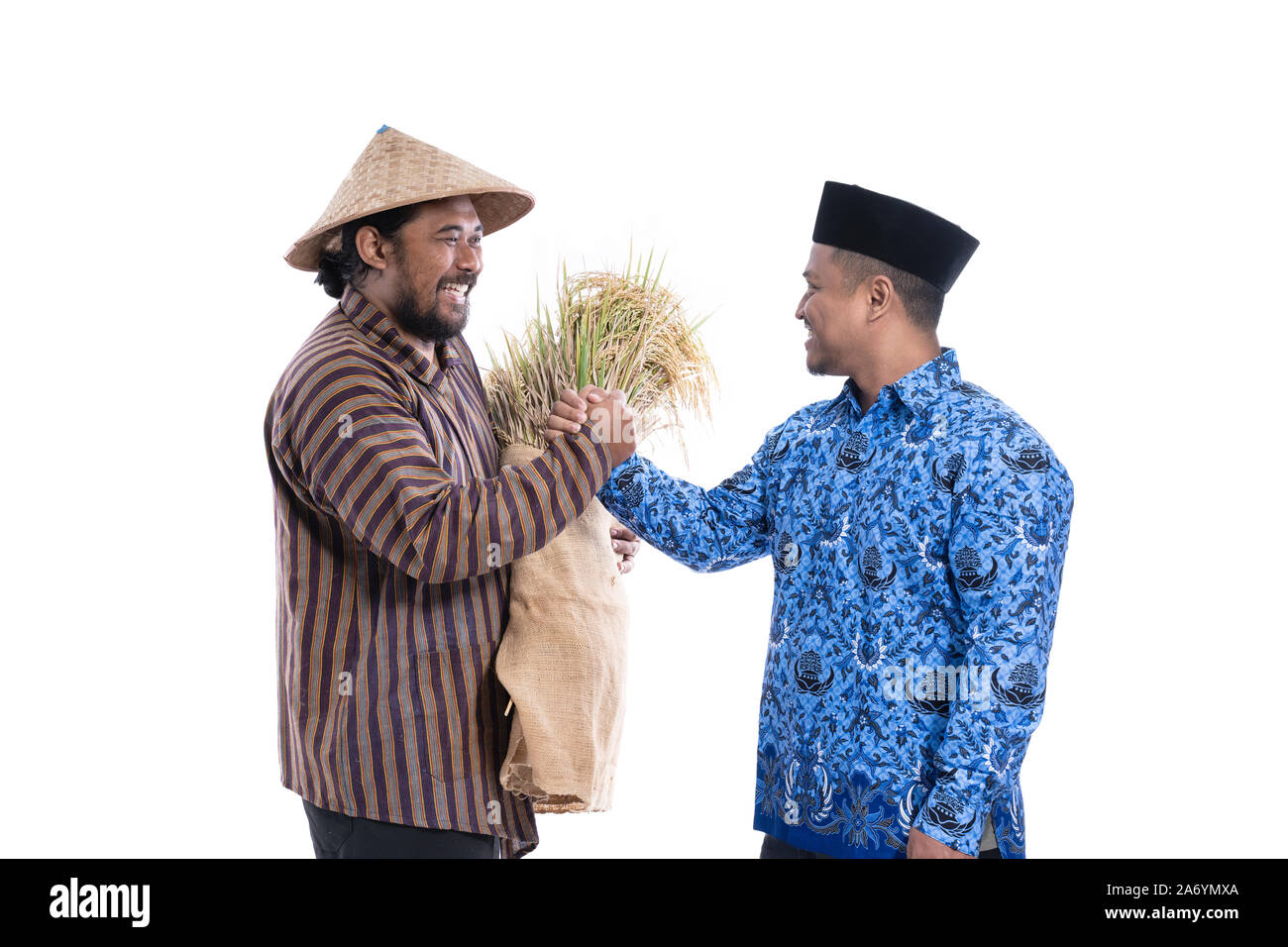 traditional indonesia worker and farmer shaking hand together Stock ...