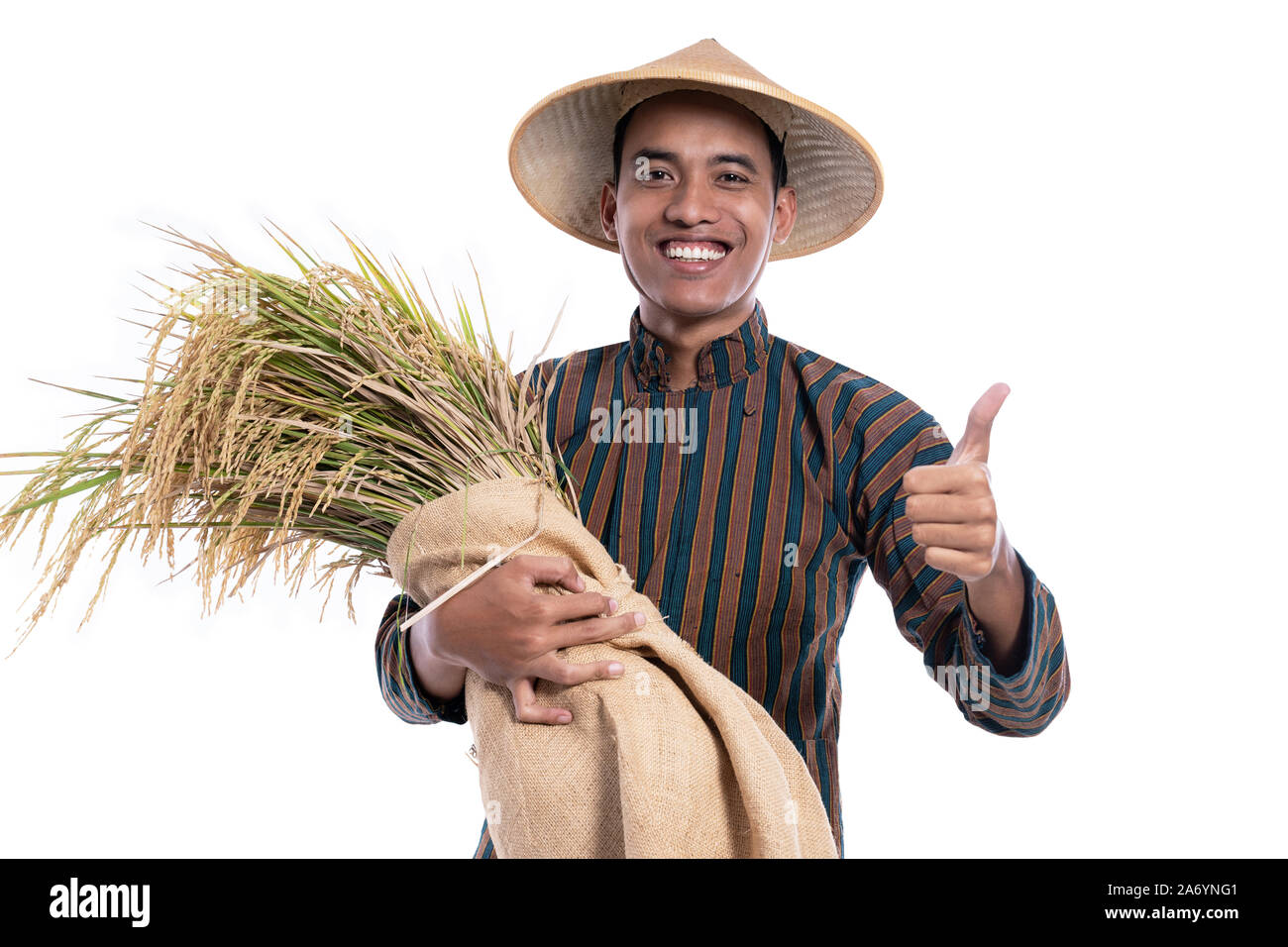 rice farmer showing thumb up isolated Stock Photo - Alamy