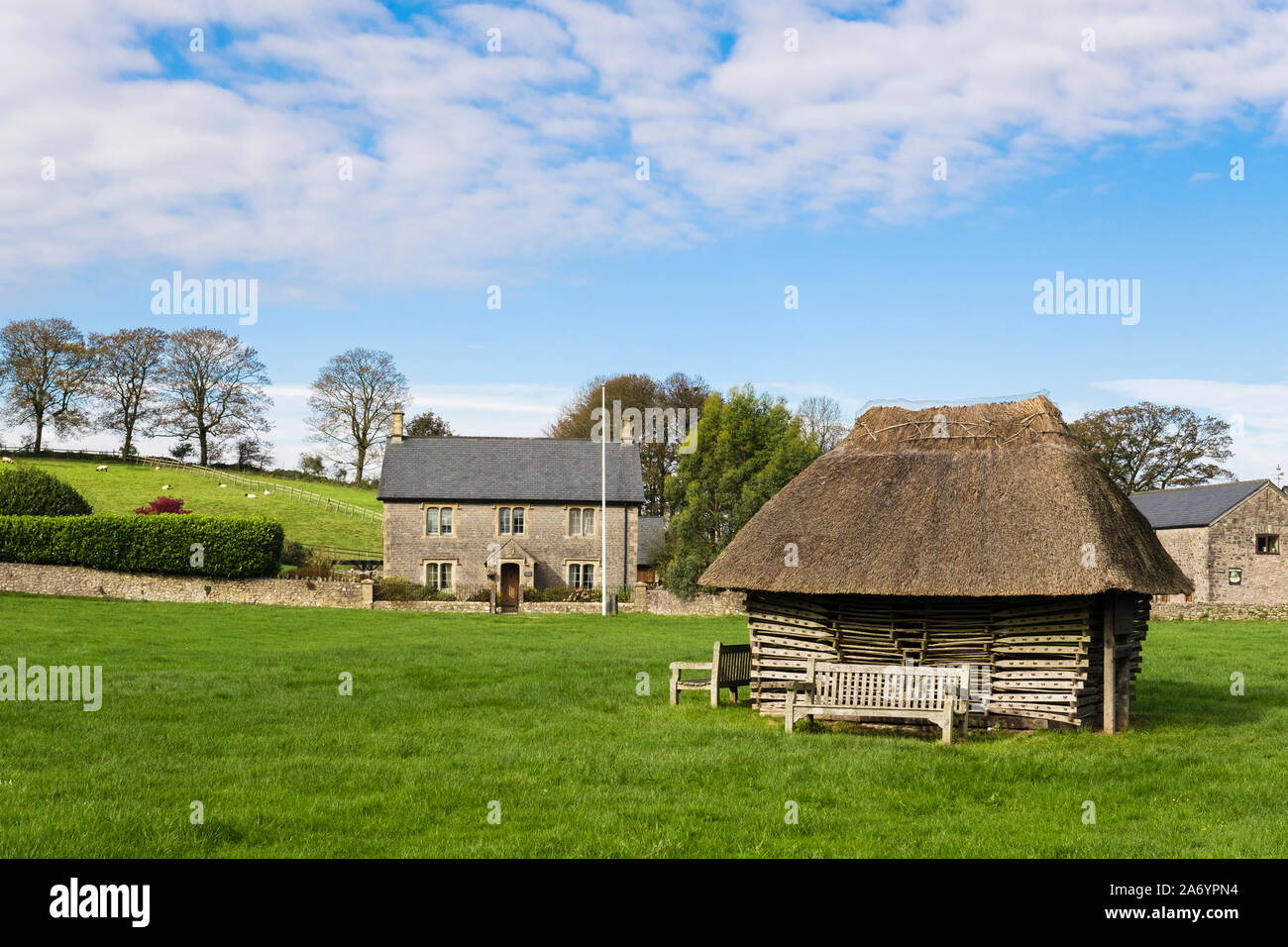 Stack of sheep hurdles stacked on the country village green in Mendips ...