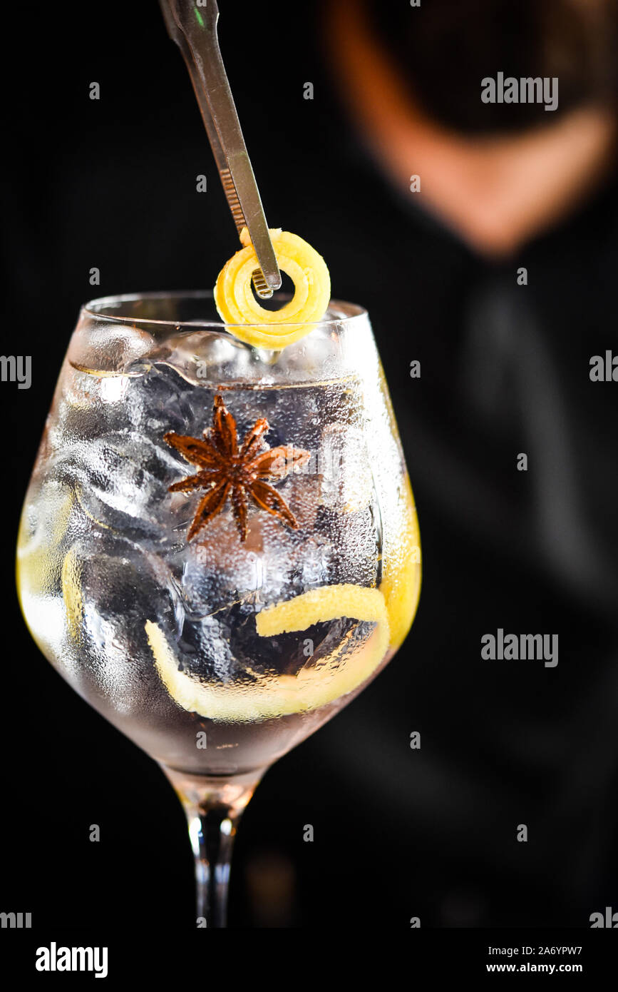 delicious gin tonic with anise & fresh lemon Stock Photo - Alamy