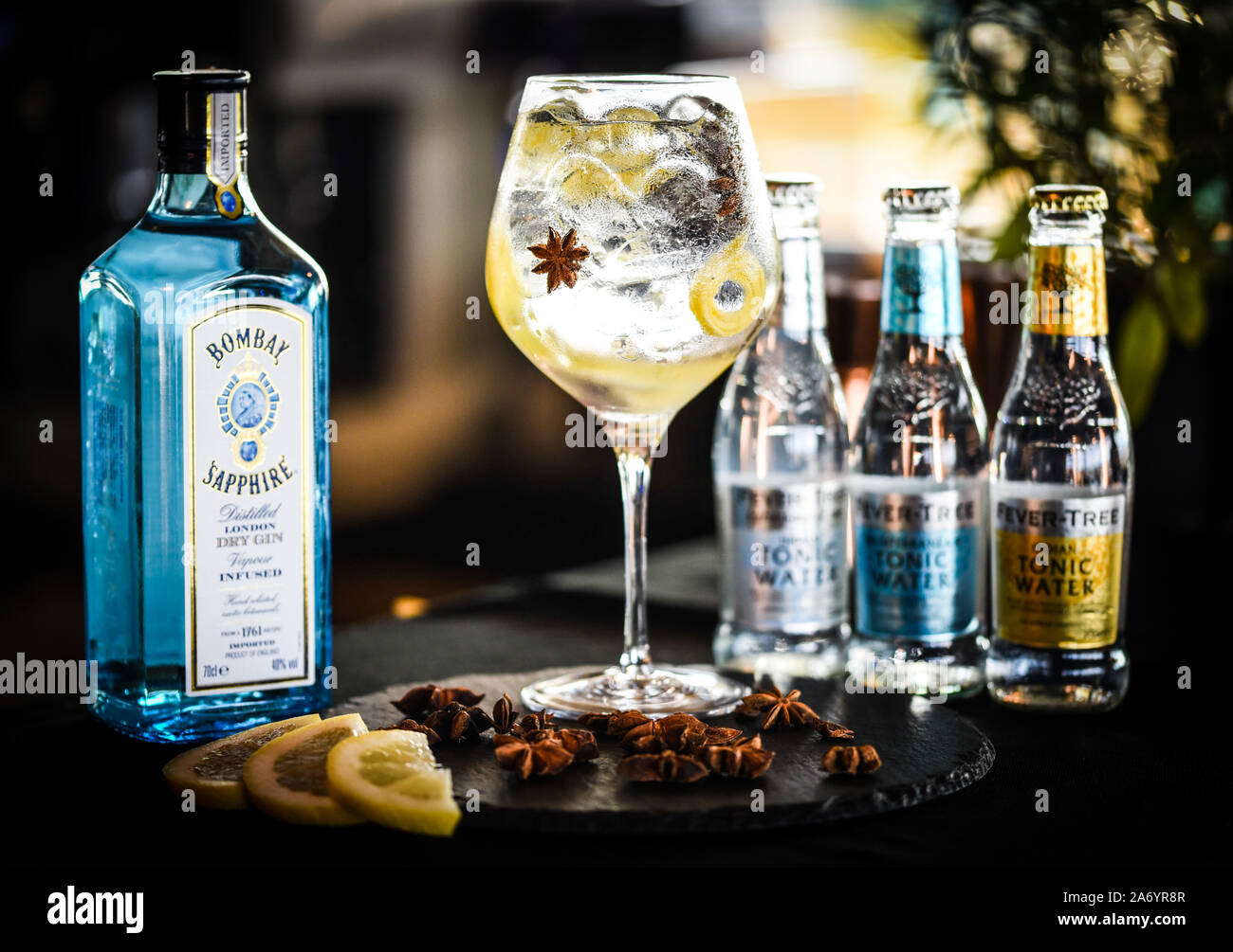 delicious gin tonic with anise & fresh lemon Stock Photo - Alamy