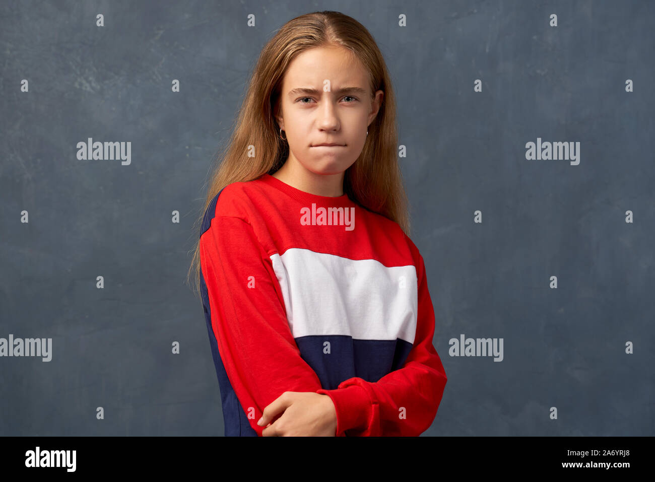 Sad pretty woman with gloomy sullen expression Stock Photo - Alamy