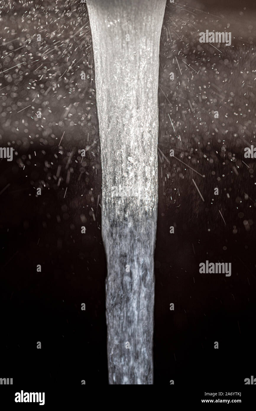 Water droplet falling from tap hi-res stock photography and images - Alamy