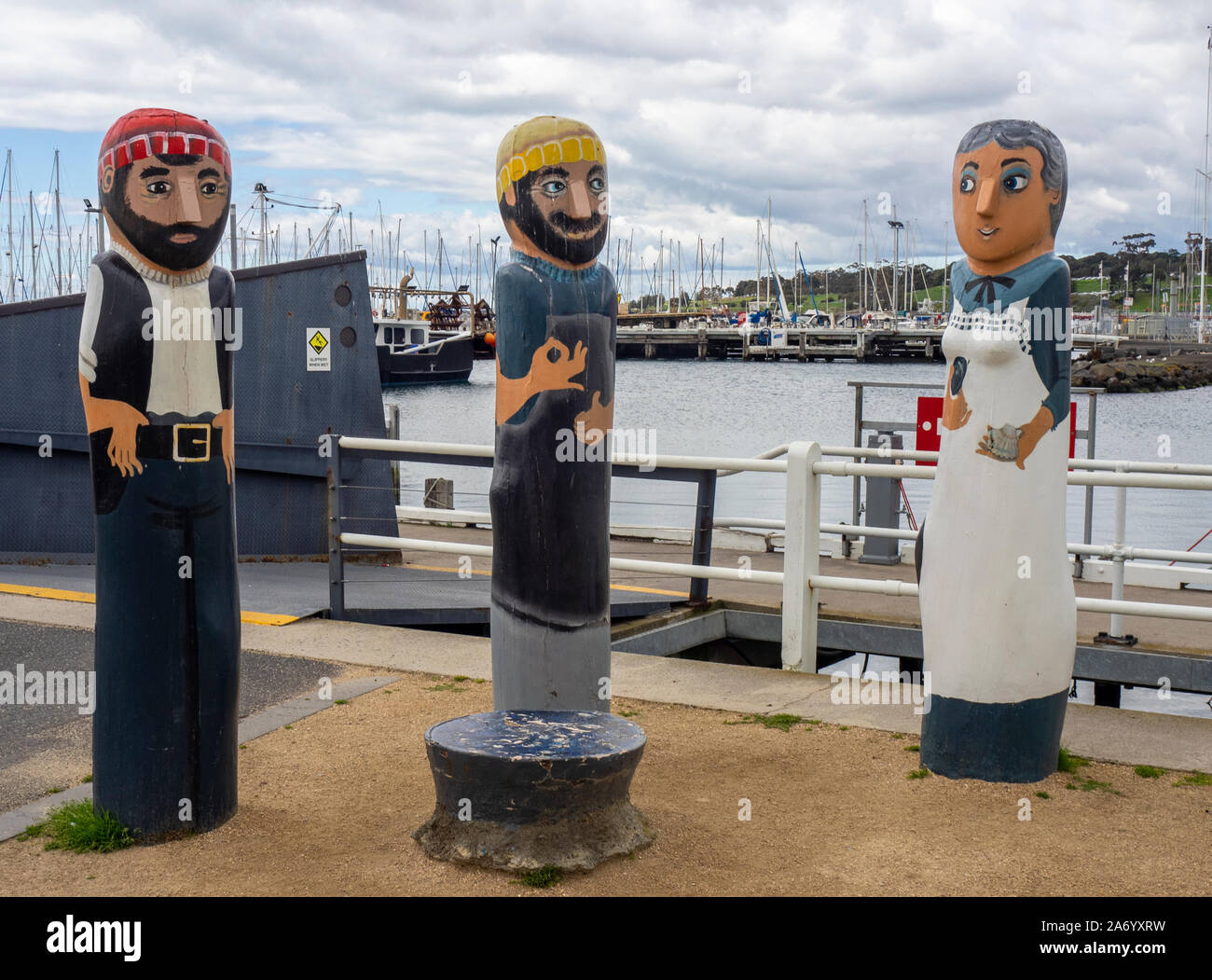 Baywalk bollard trail walk wooden sculptures of fishermen and wife by ...