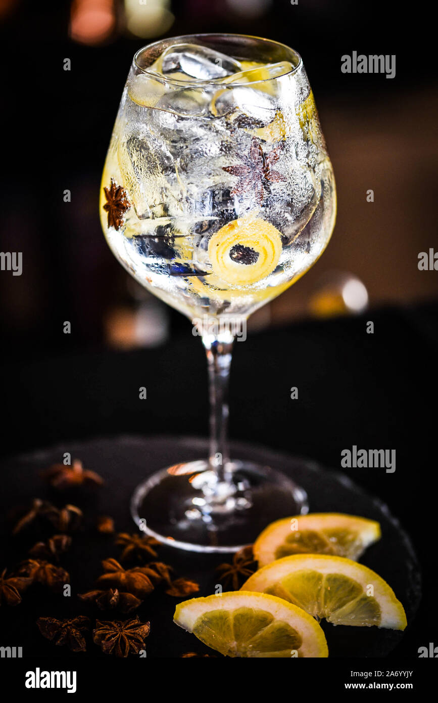 delicious gin tonic with anise & fresh lemon Stock Photo - Alamy