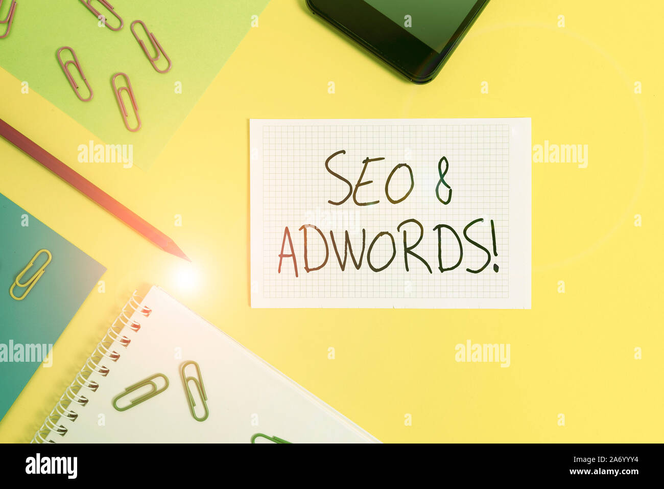Writing note showing Seo And Adwords. Business concept for they are ...