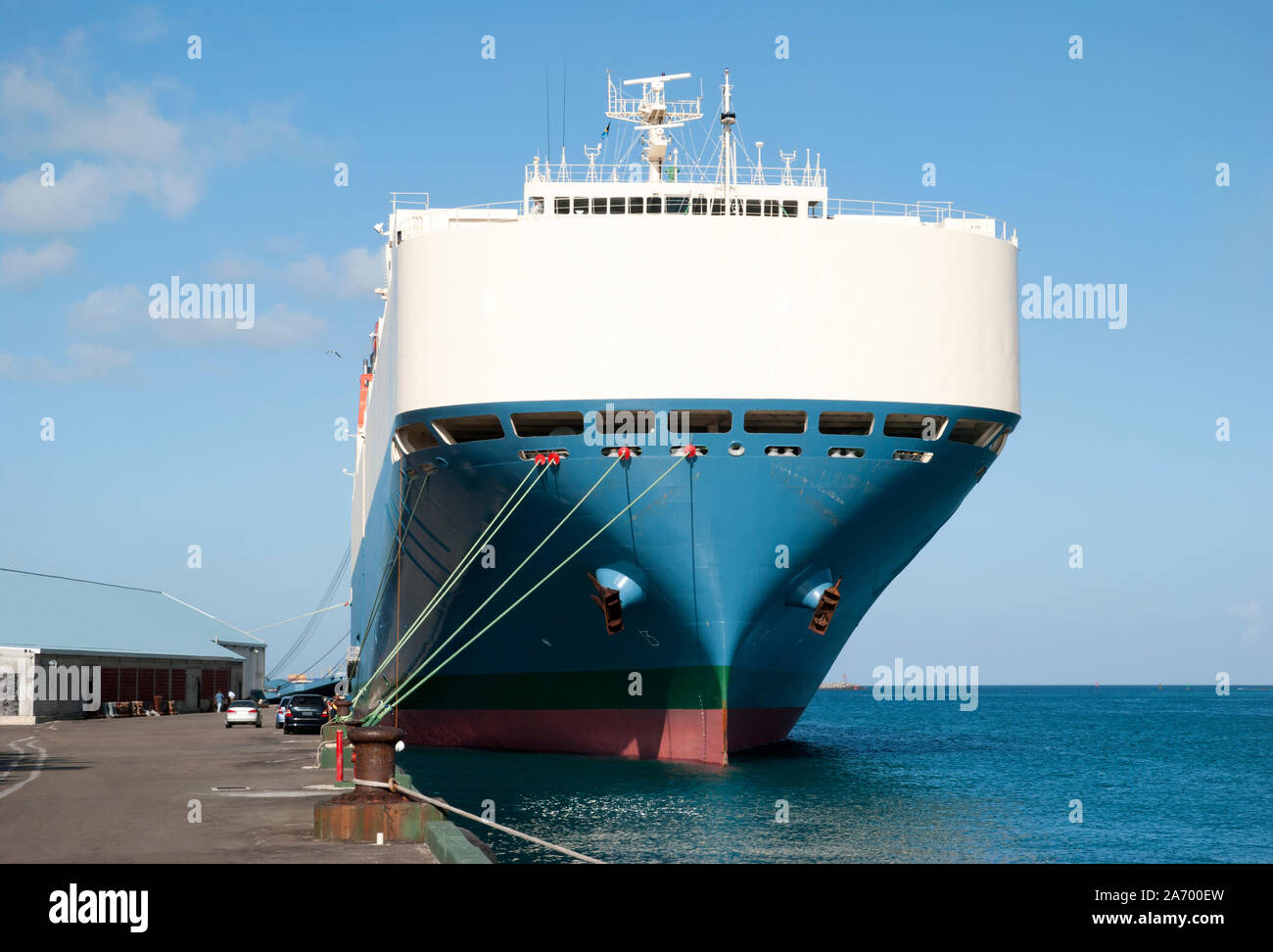 The large cargo ship moored in Nassau city port (Bahamas Stock Photo ...