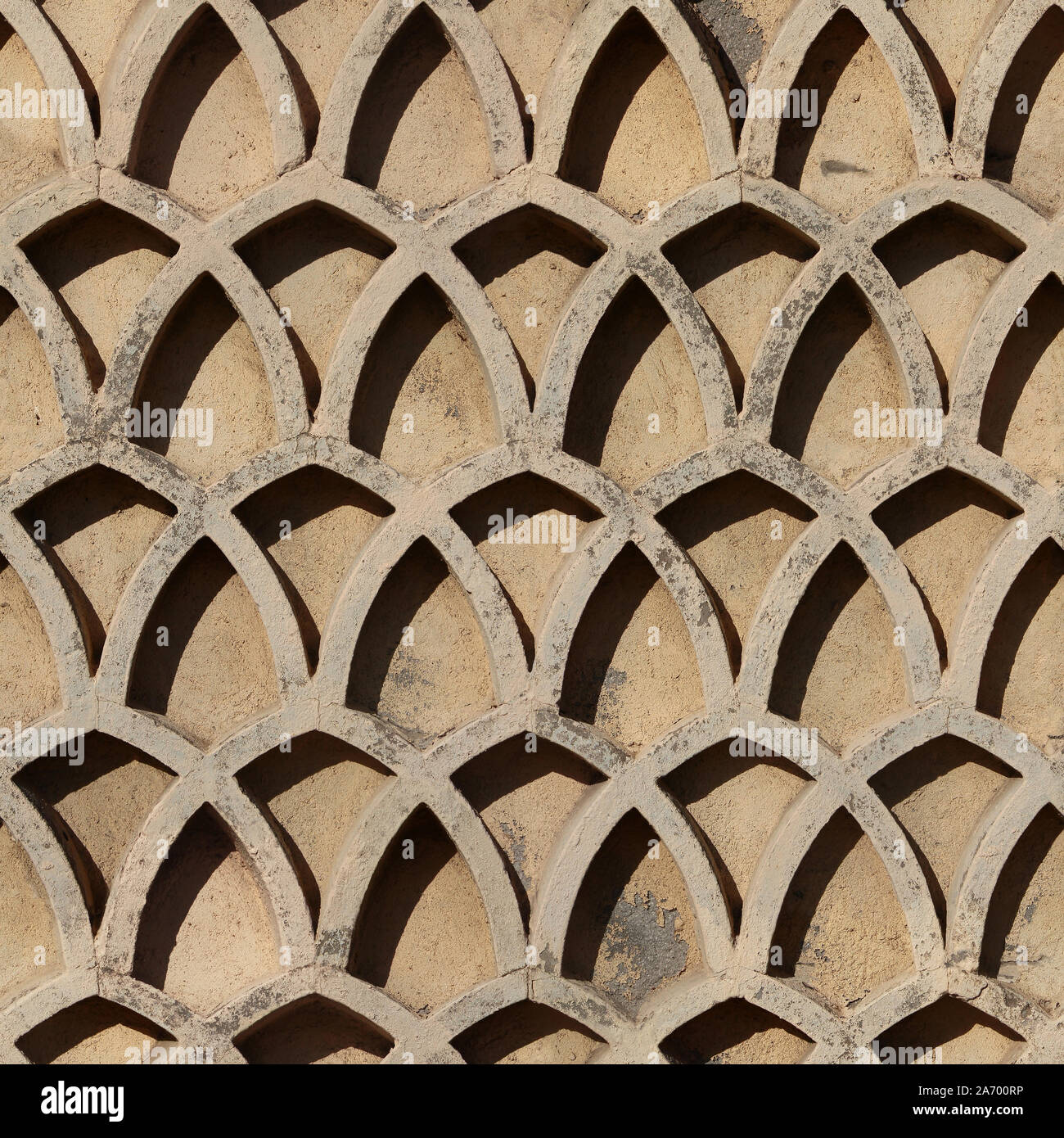 Seamless texture of old shabby concrete fence decorated with arches ...