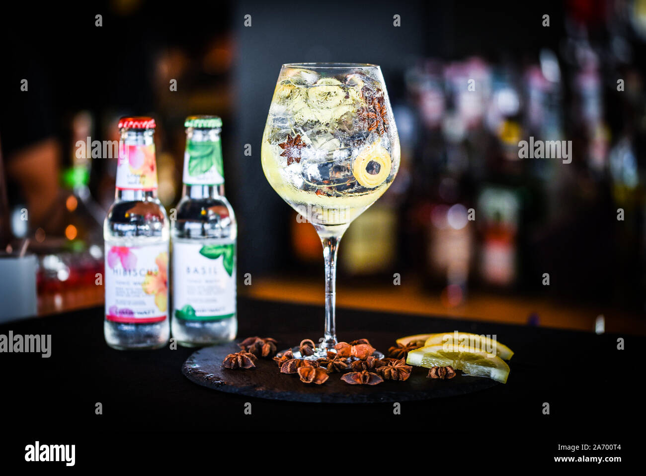 delicious gin tonic with anise & fresh lemon Stock Photo - Alamy