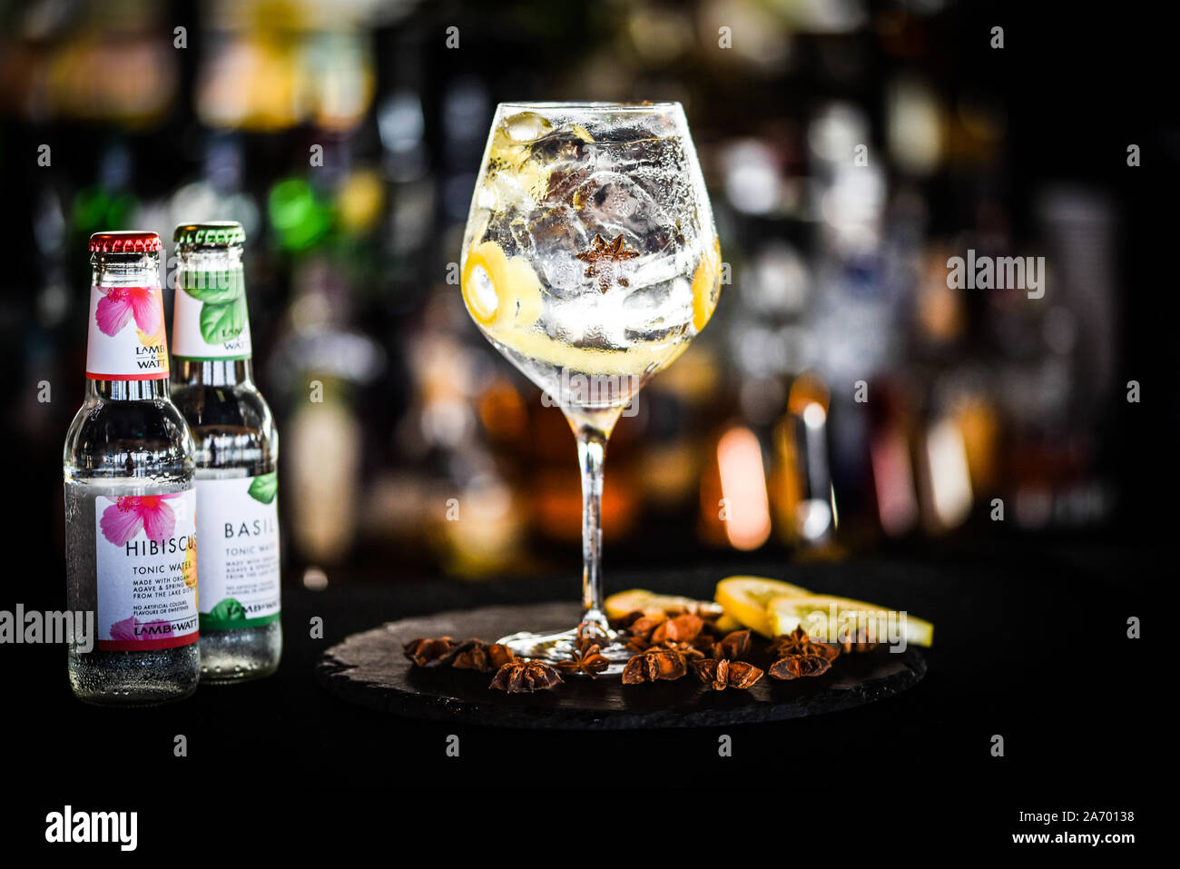 delicious gin tonic with anise & fresh lemon Stock Photo - Alamy